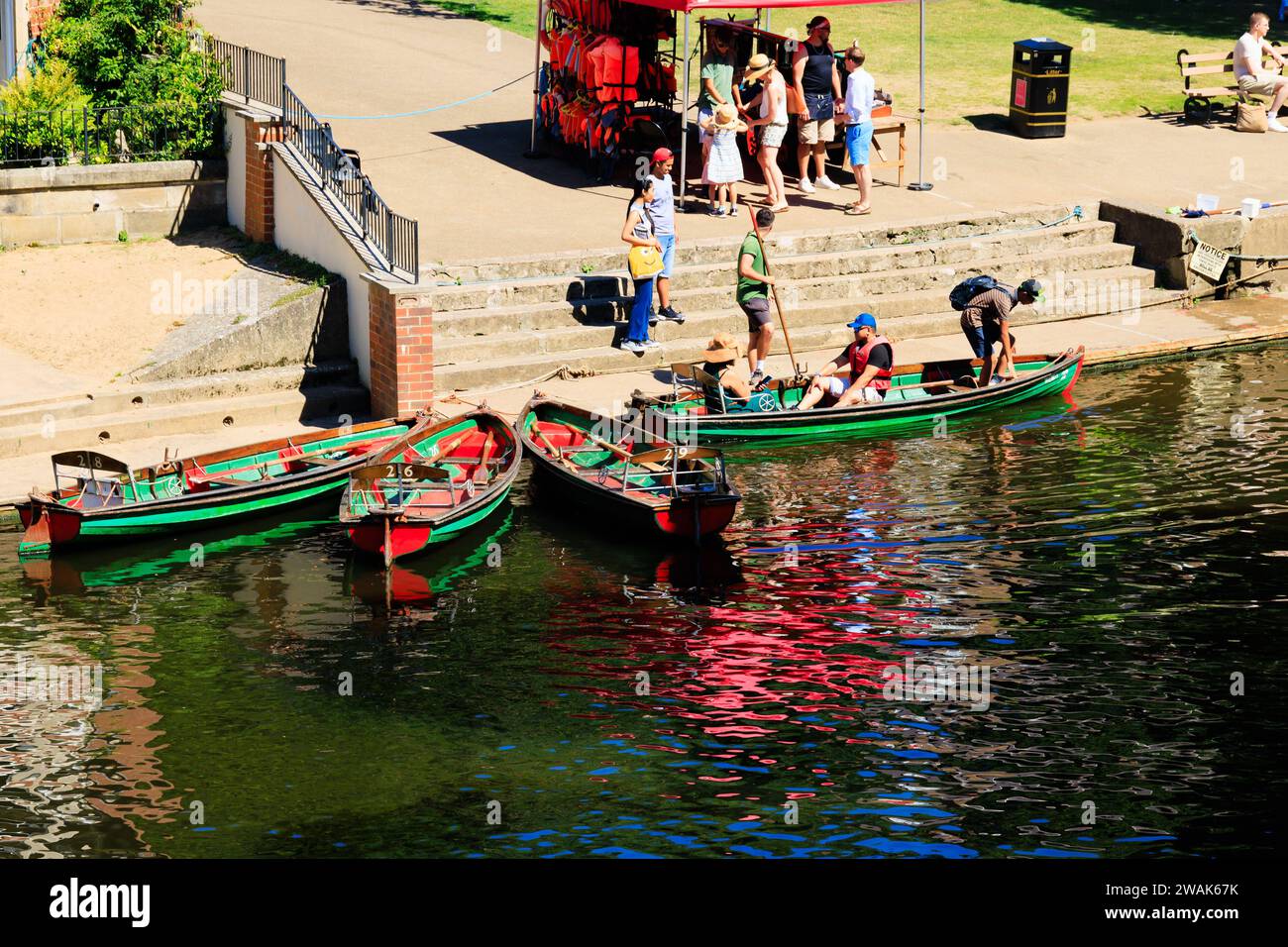 Tourists boarding S.J. Kirkley rowing boats for hire on the River Nidd ...