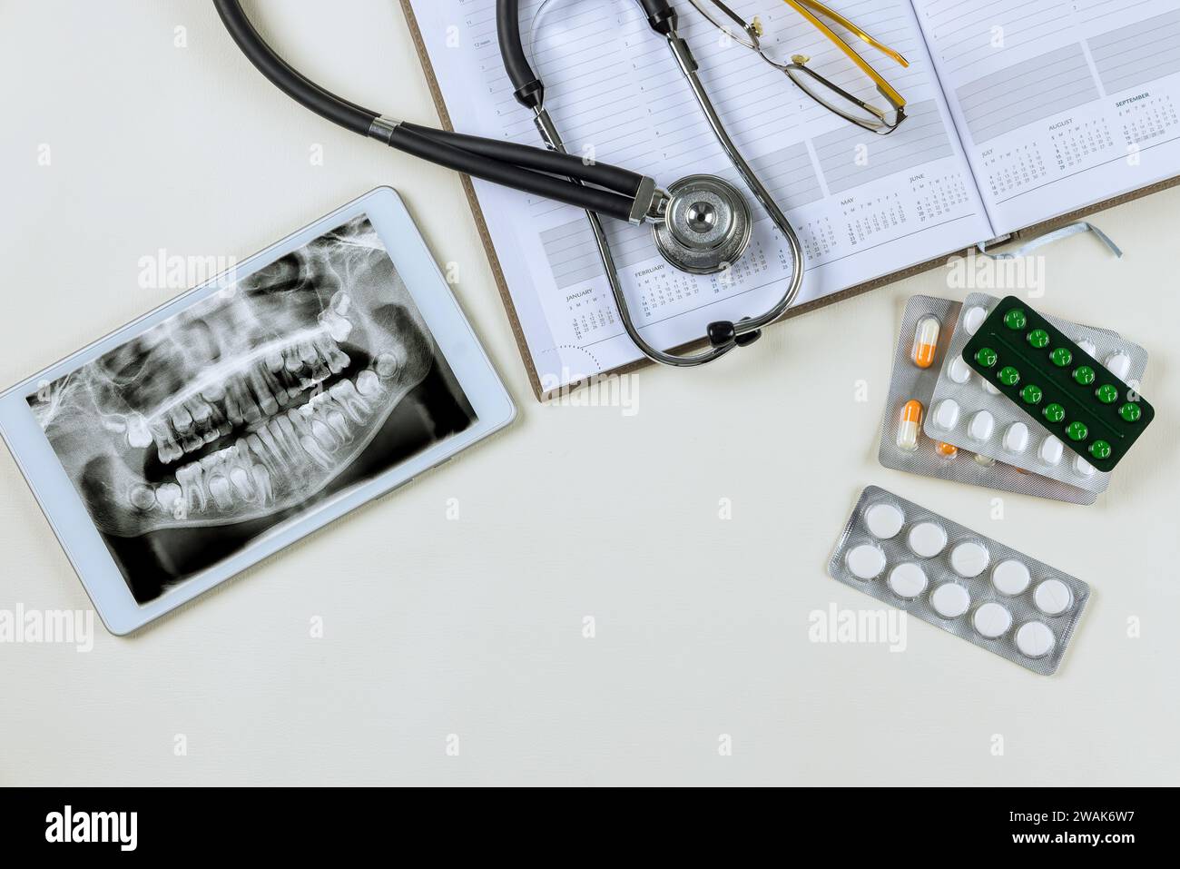 Before treatment, dentist examines digital stomatologist x-ray of ...