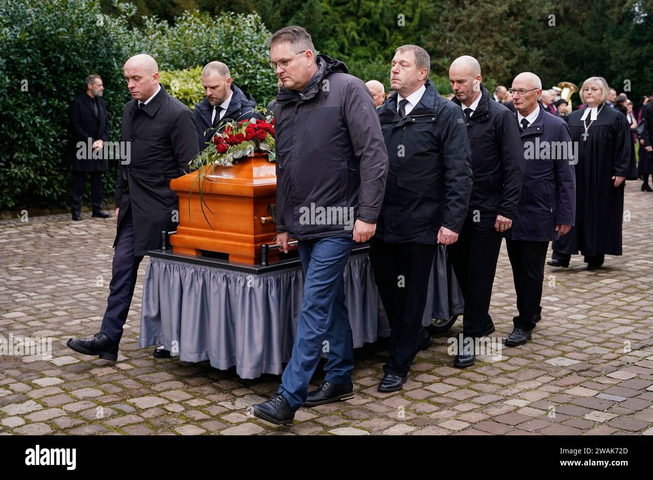 Offenburg, Germany. 05th Jan, 2024. Former bodyguards carry the coffin ...