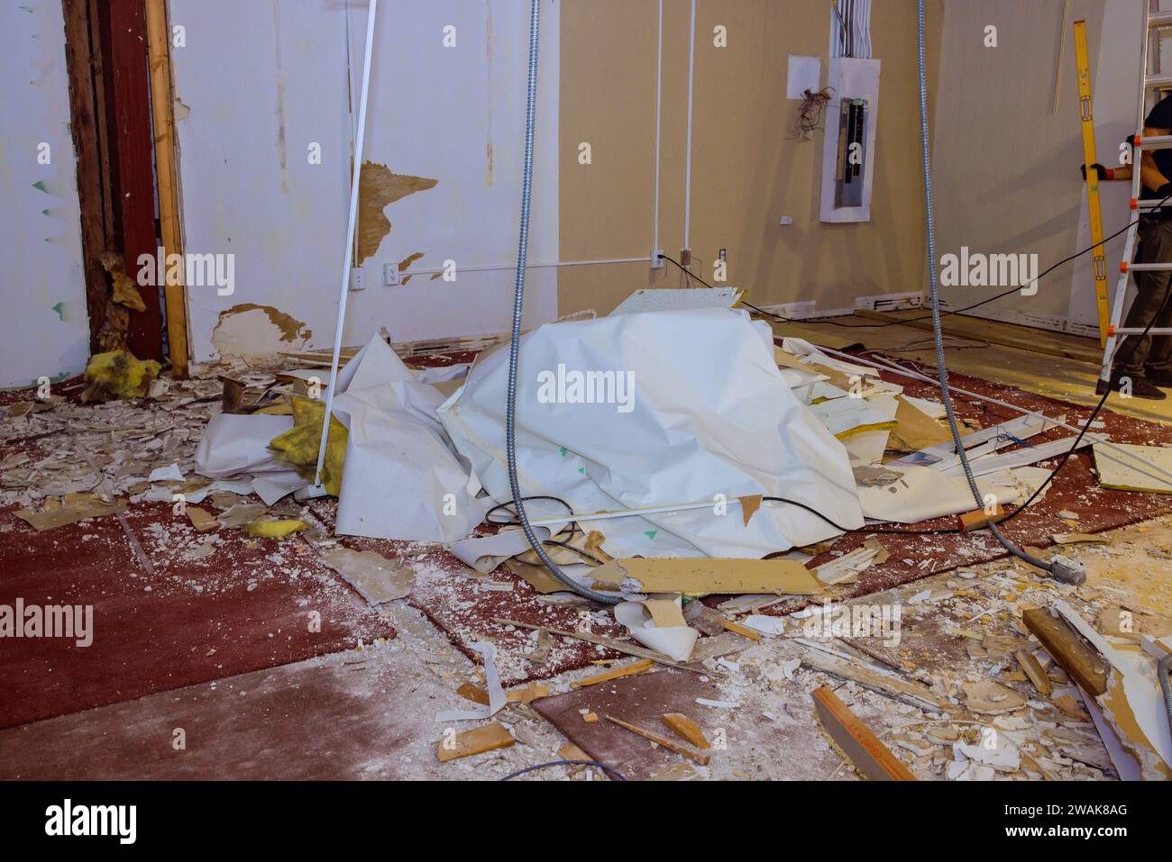 When reconstructing house, old damaged plasterboard drywall must be ...