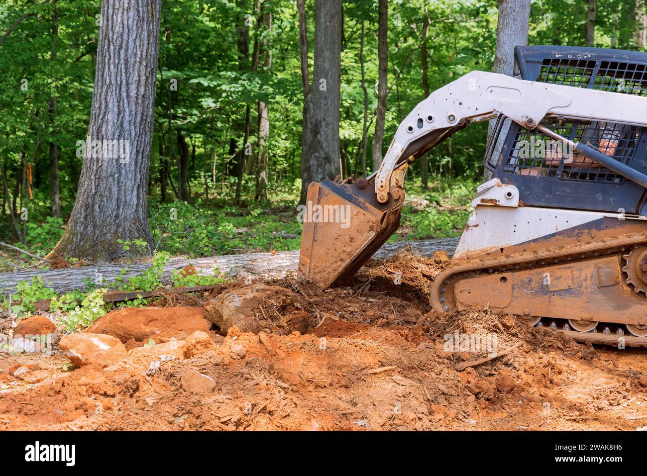 Use of mini bulldozer is used for earth moving, landscaping improving ...
