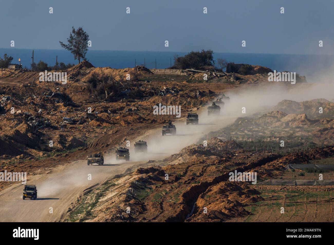 Israel. 05th Jan, 2024. APC vehicles drive along the Gaza-Israel border ...