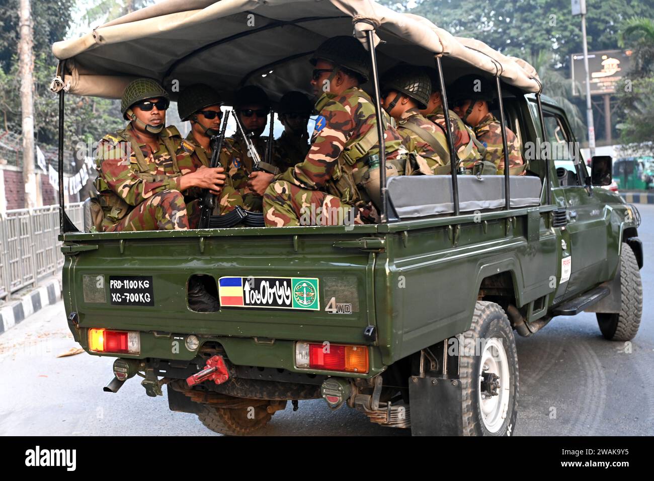 Dhaka, Bangladesh, on January 5, 2024. Bangladesh Army personnel sit in ...
