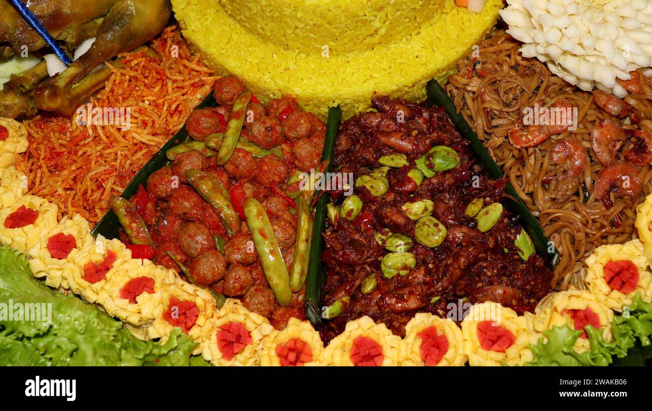 Rice in a cone shape or called Nasi Tumpeng A festive Indonesian rice ...