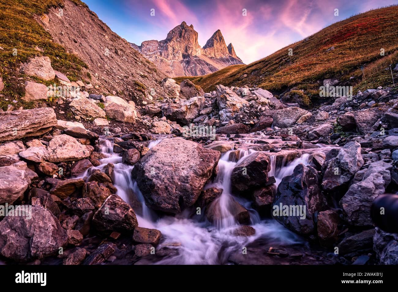 Dramatic landscape of Aiguilles d'Arves with iconic three mountain and ...
