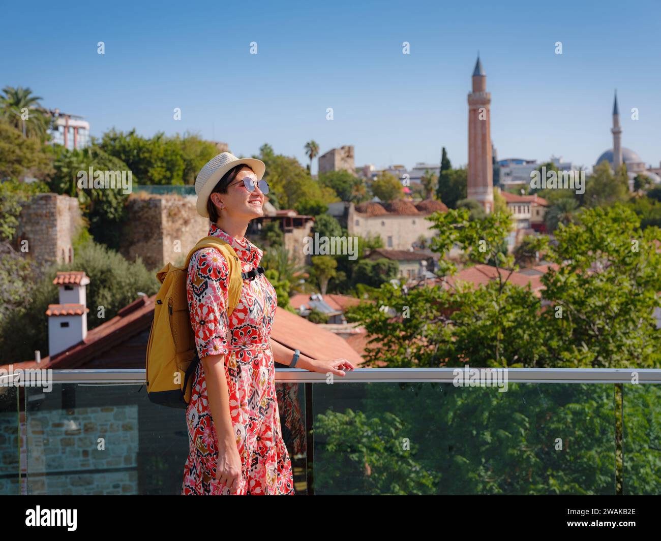 female summer travel to Antalya, Turkey. young asian woman in red dress ...