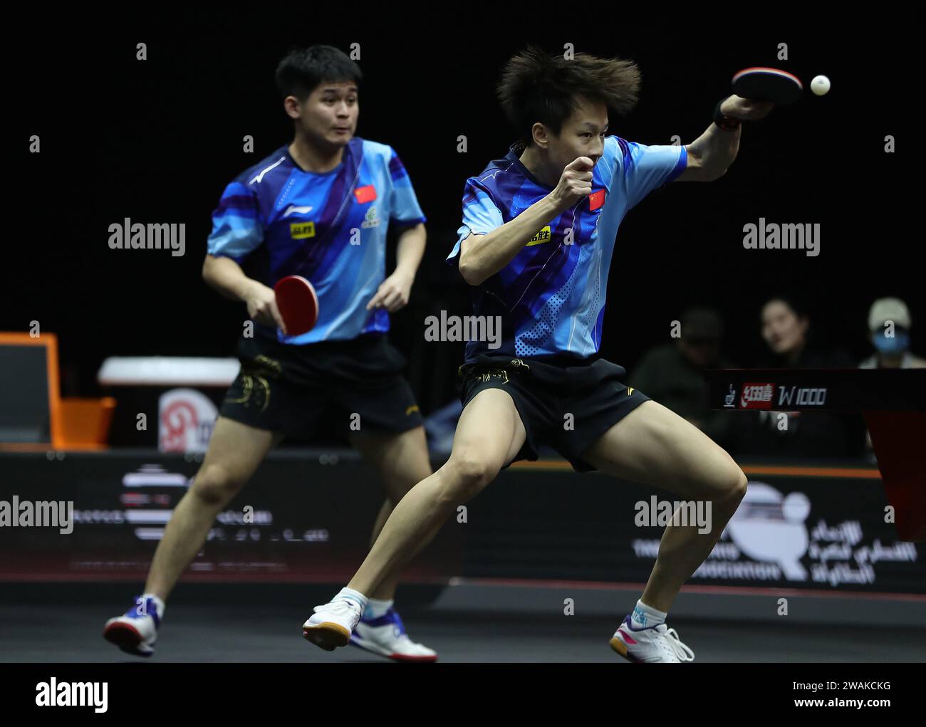 Doha, Qatar. 5th Jan, 2024. Lin Gaoyuan (R)/Lin Shidong compete during ...