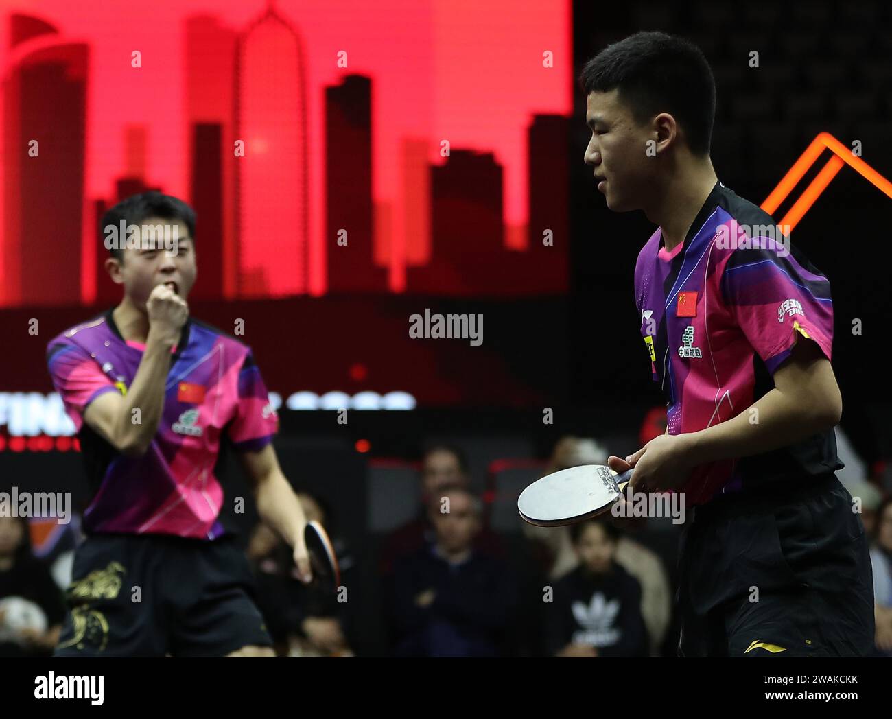 Doha, Qatar. 5th Jan, 2024. Yuan Licen/Xiang Peng (R) celebrate after ...