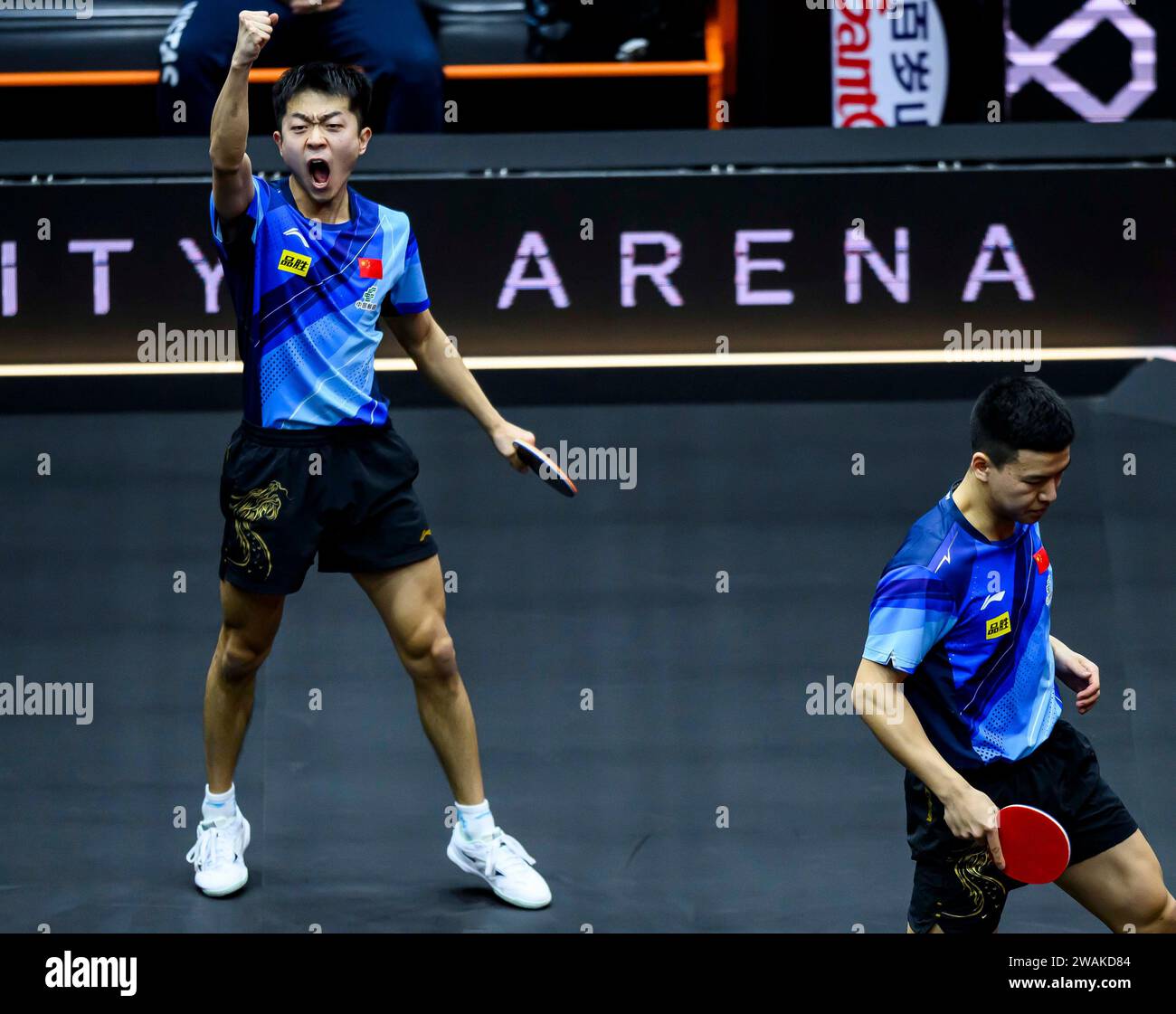 Doha, Qatar. 5th Jan, 2024. Yuan Licen (L)/Xiang Peng celebrate during ...