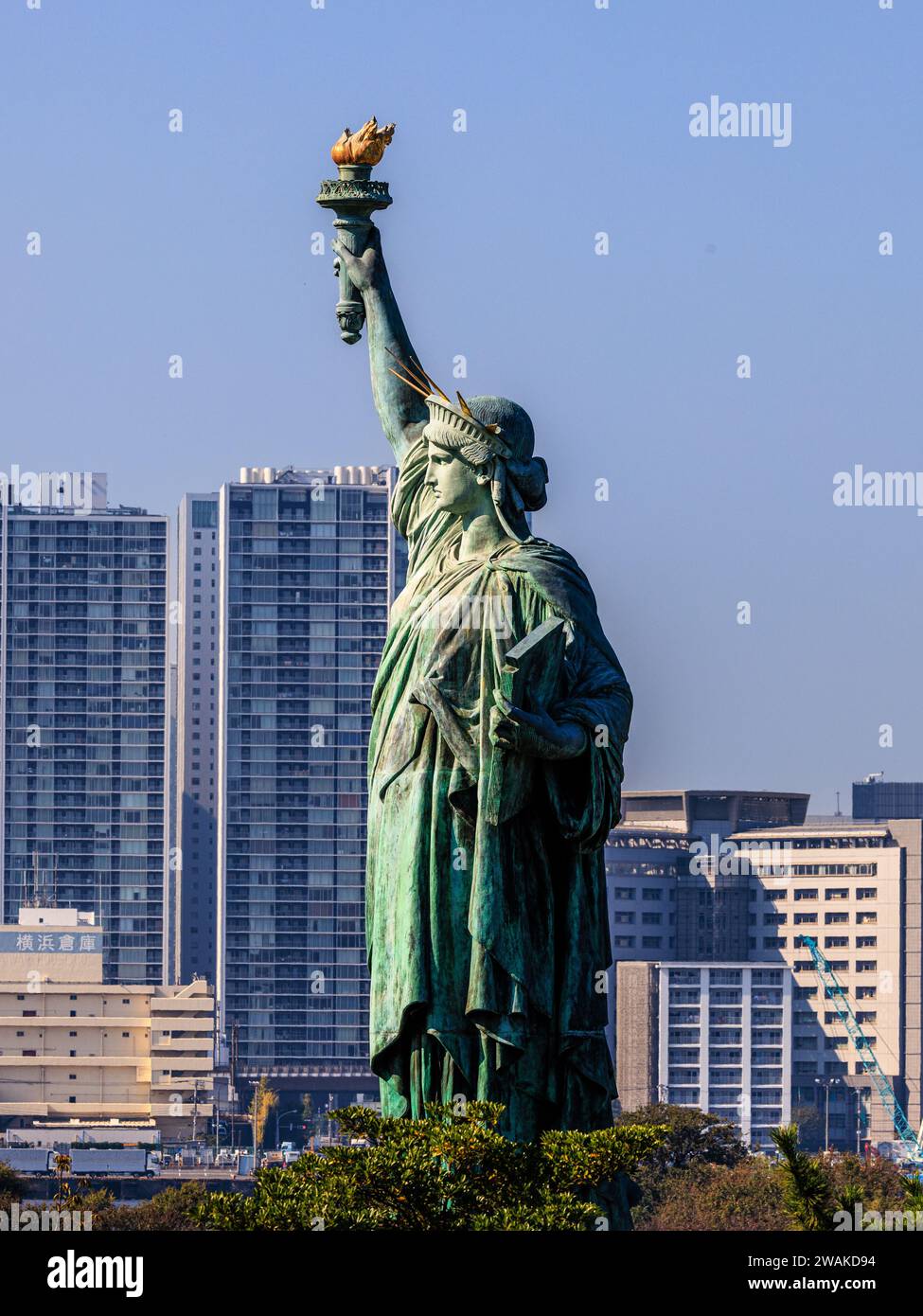 side view of full height of tokyo statue of liberty in front of ...