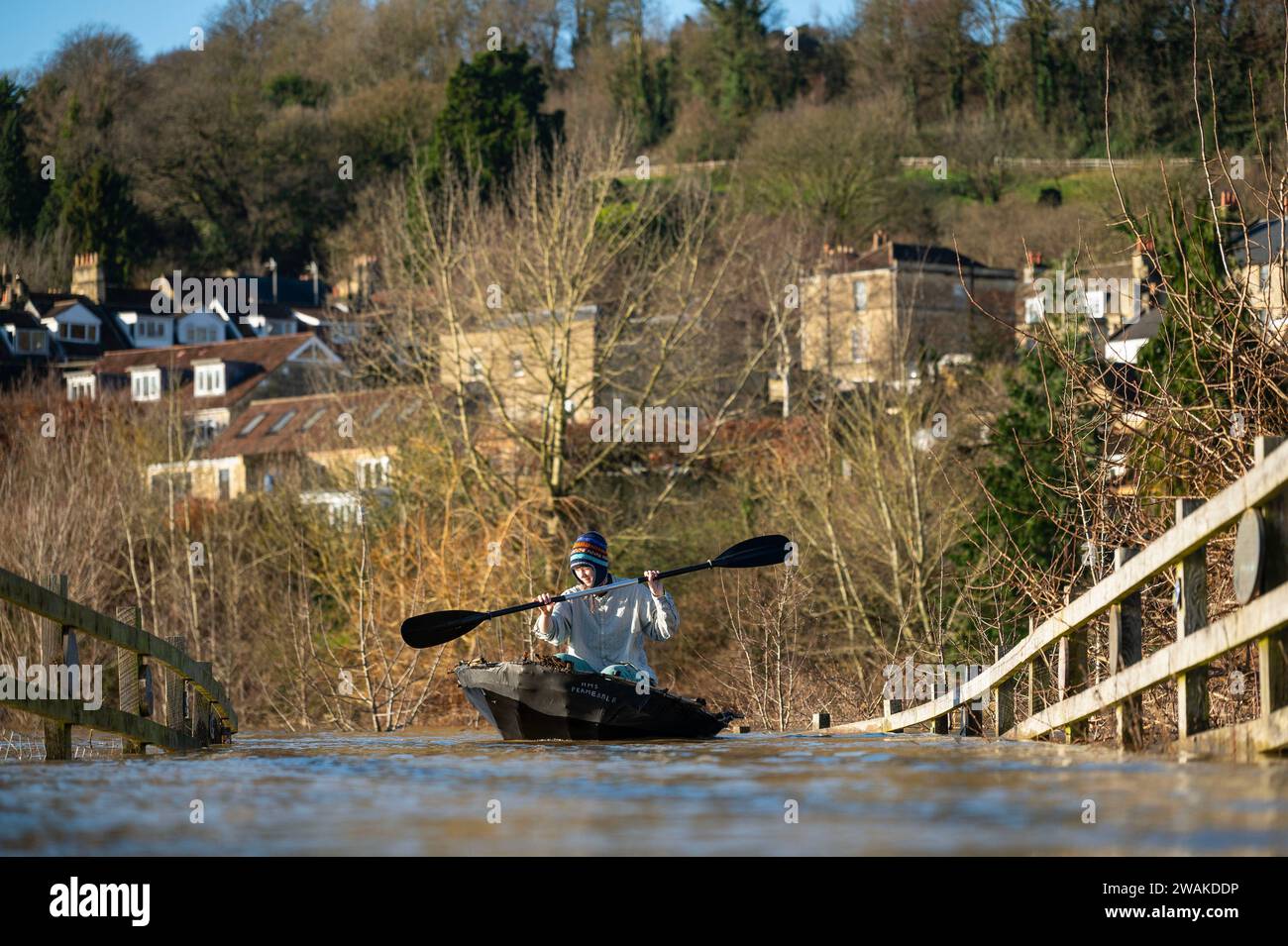 Scarlet Henderson takes to the flood water in her home made coracle ...