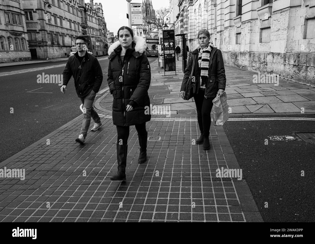 crossing a side street on Oxford High Street, Oxford, England Stock ...
