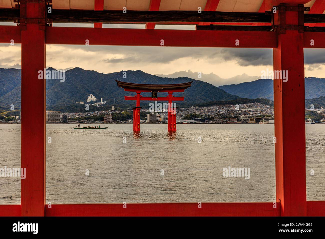 the famous floating red torii gate of miyajima island in hiroshima is ...