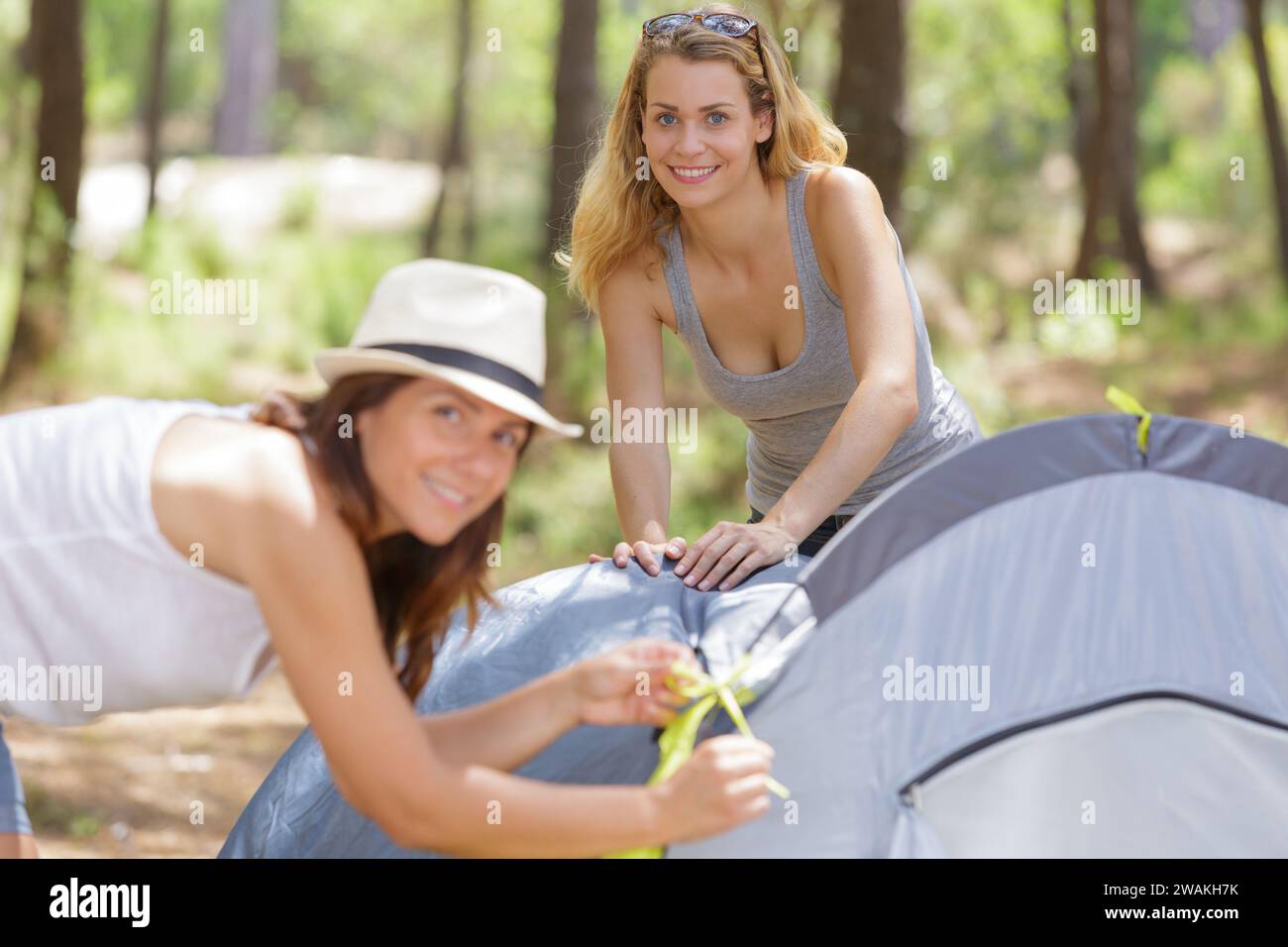 young women on camping holiday together Stock Photo - Alamy