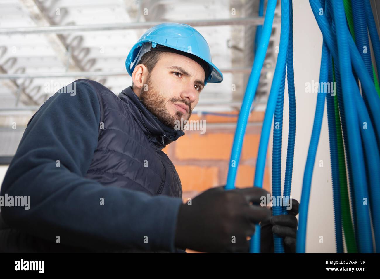 Electrical worker wiring in hi-res stock photography and images - Alamy
