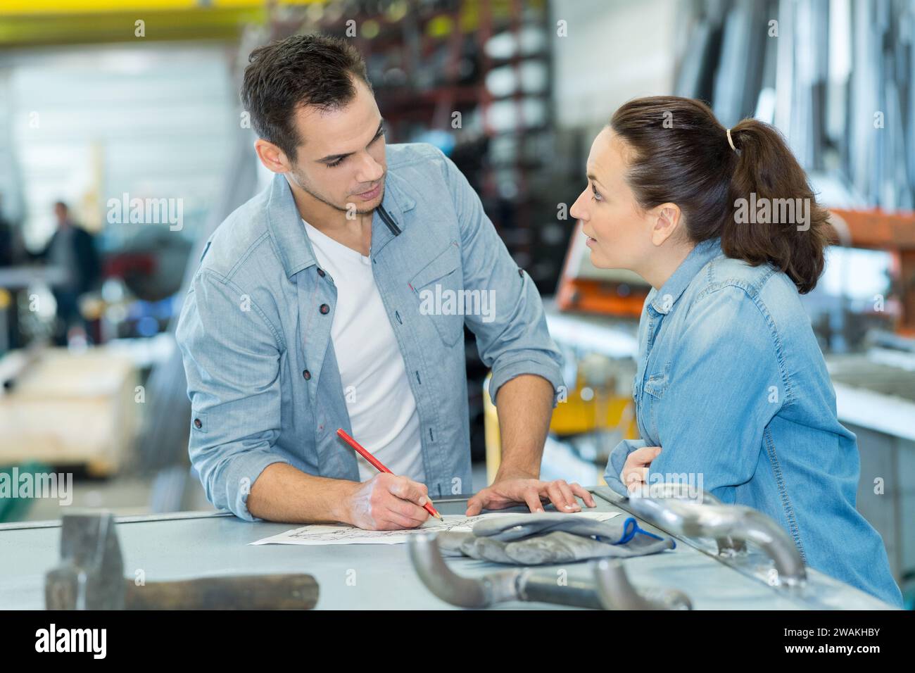Two female engineers discussing project hi-res stock photography and images - Alamy