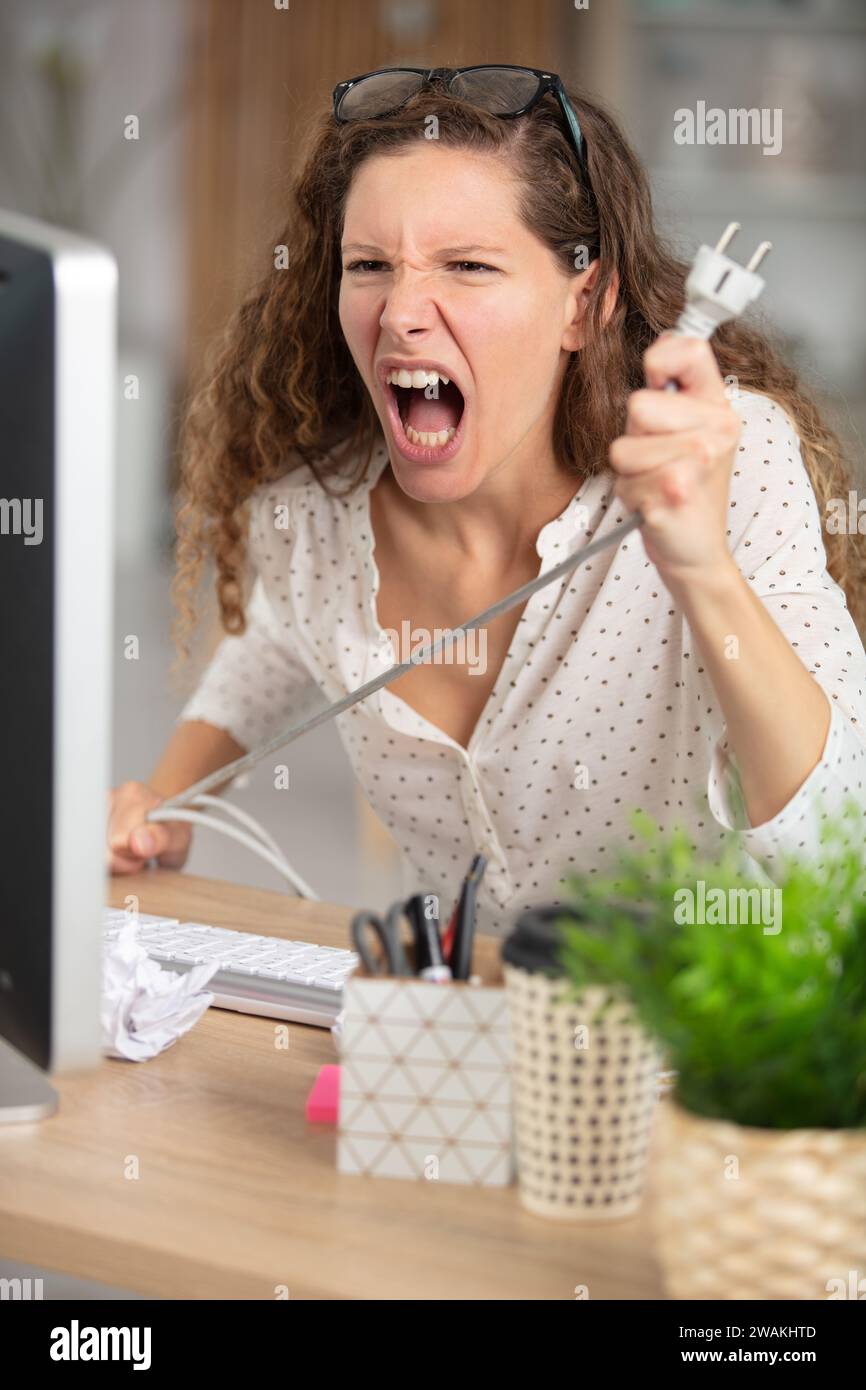 office worker angry against computer Stock Photo - Alamy