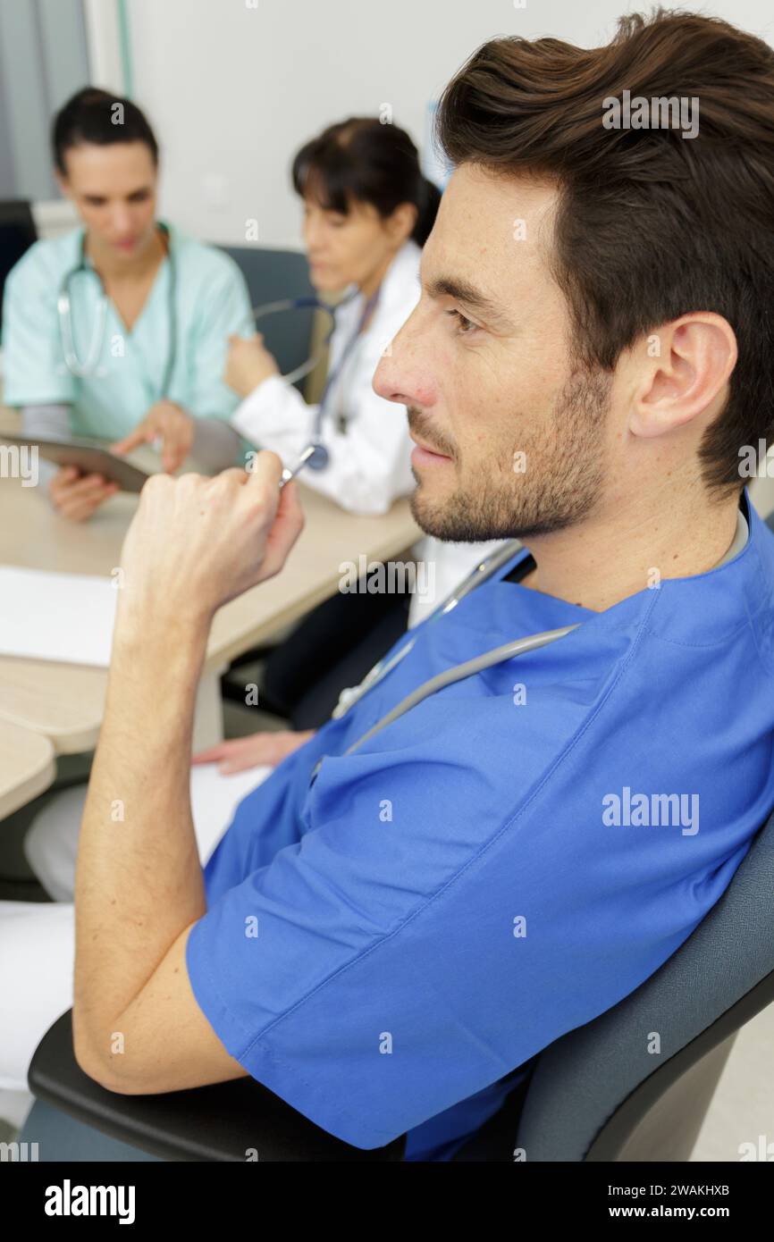 Friendly doctor working on laptop hi-res stock photography and images ...