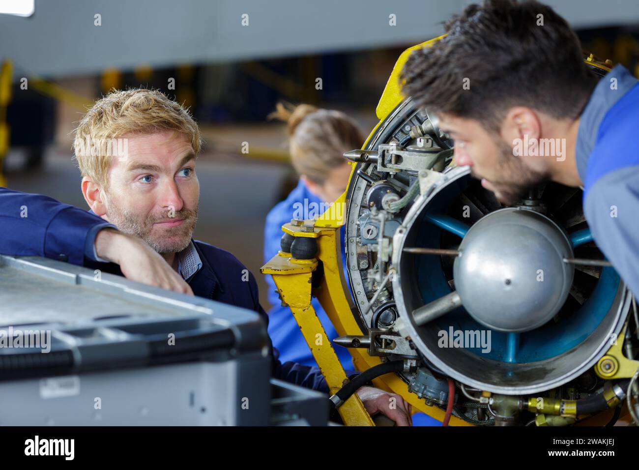 apprentices aeronautical engineers learning with their professor Stock ...
