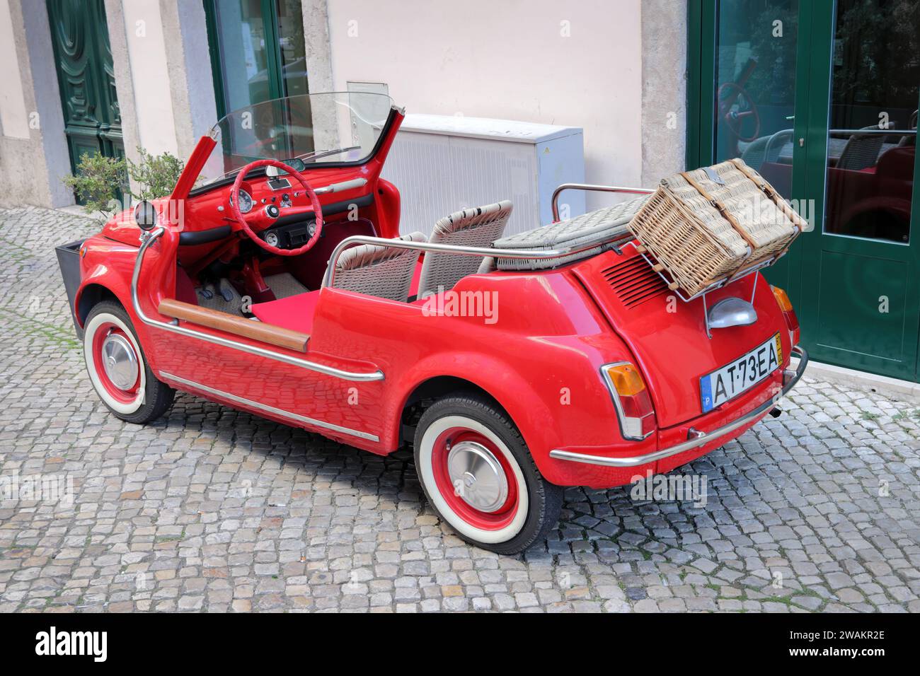 red retro FIAT 500 convertible in Lisbon Stock Photo - Alamy