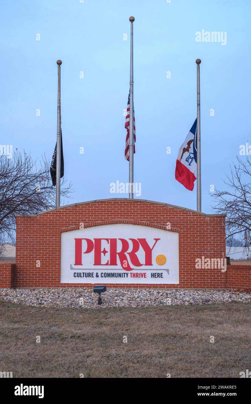 Perry, IA, USA. 5th Jan, 2024. The flags at a welcome sign are at half ...