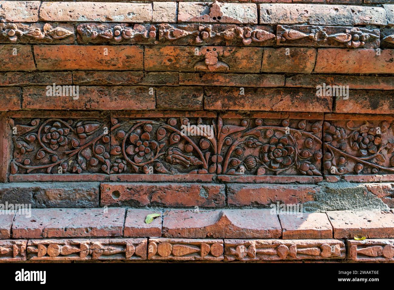 Terracotta patterns ancient stone carving, pattern on stone wall of Bagha Shahi Mosque Stock ...