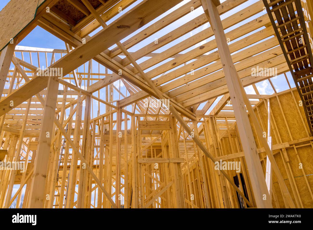 An framing beams used in construction of wooden framework for new house ...
