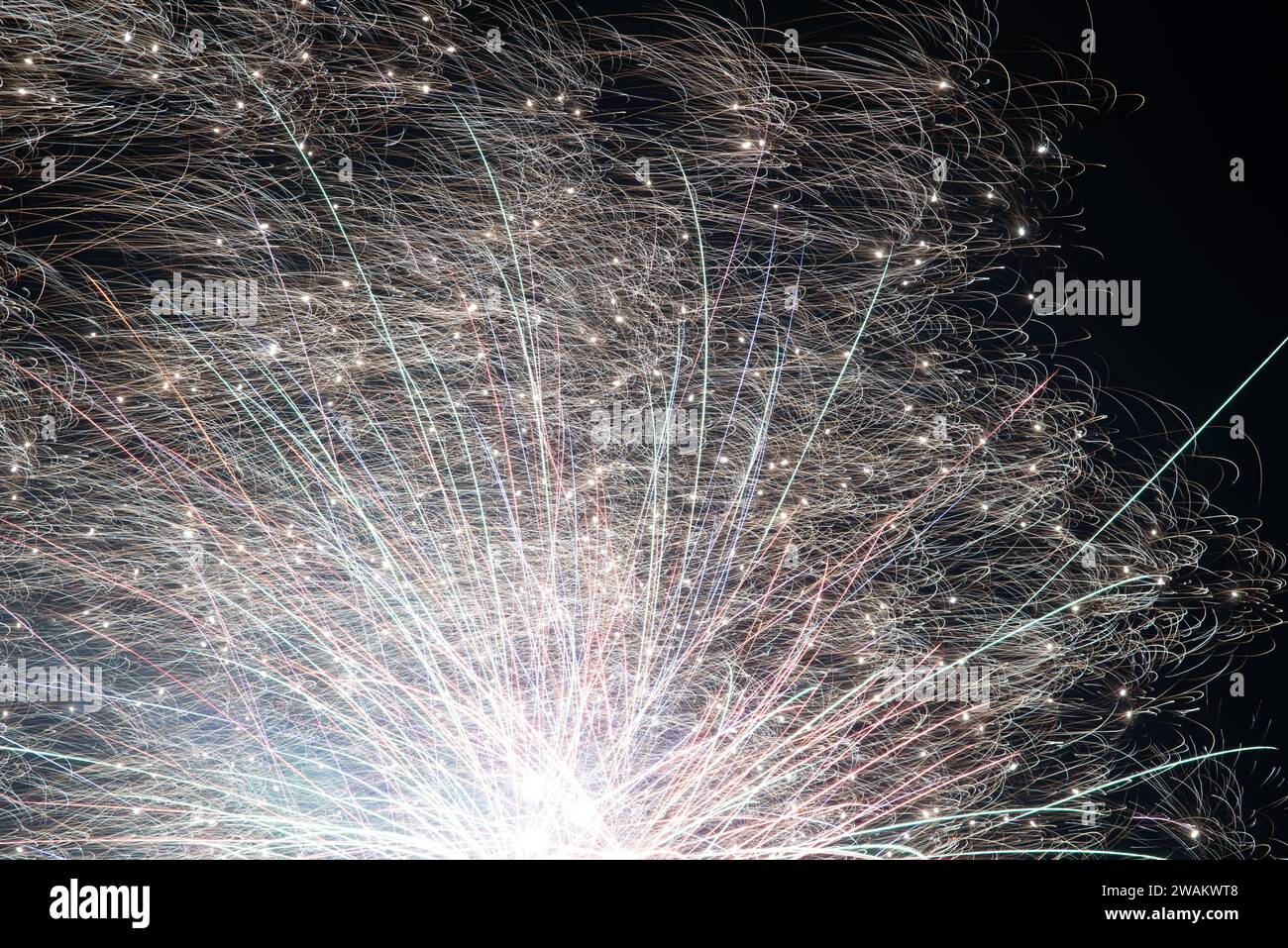 picture with fireworks to welcome the new year, light flowers in the ...