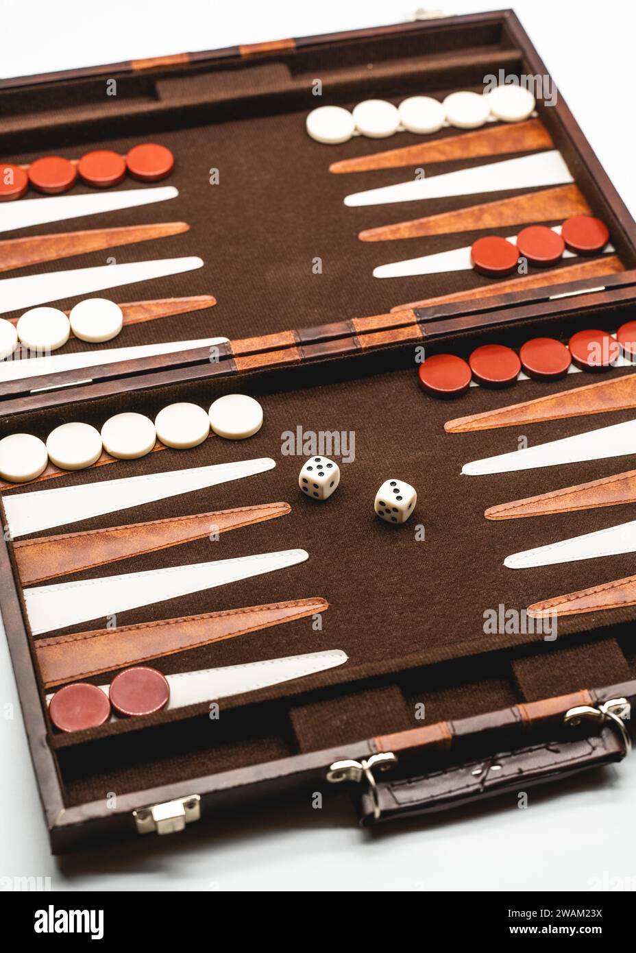 Brown felt backgammon table with dice in a folding case Stock Photo - Alamy