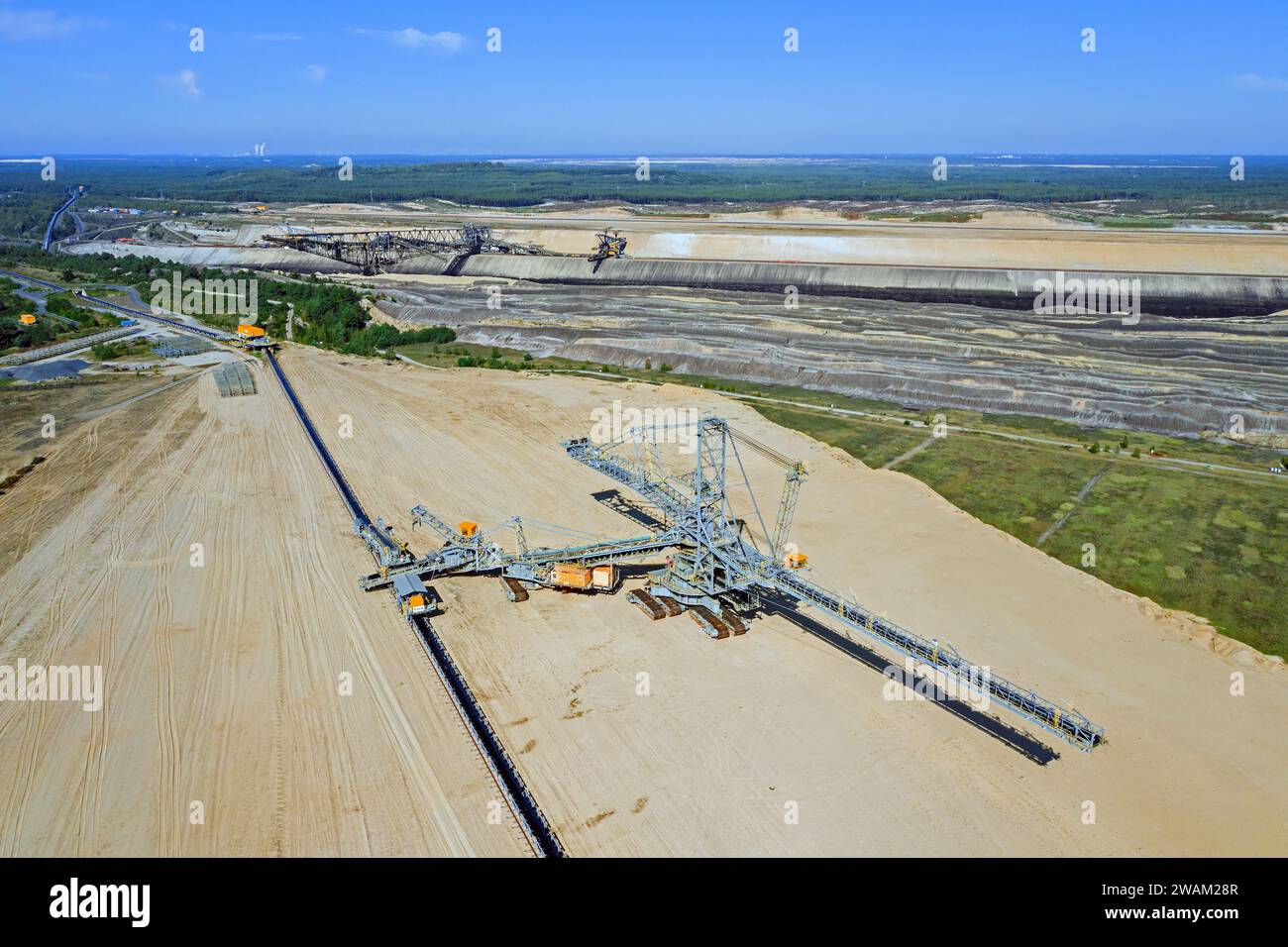 Brown coal being extracted by huge bucket-wheel excavator (BWE) at the ...