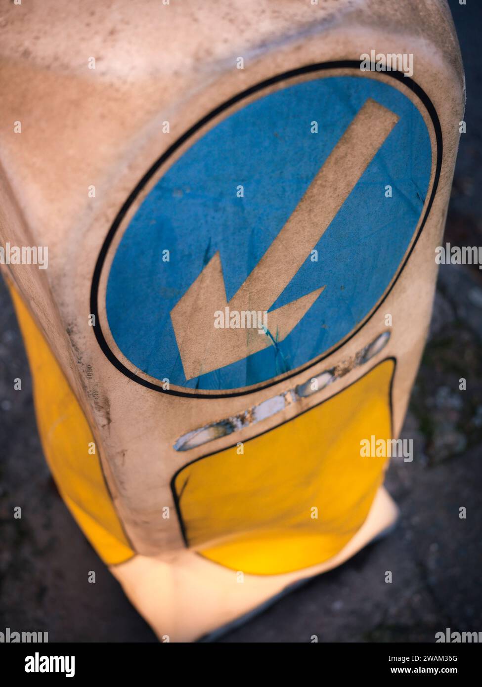 traffic bollard indicating vehicles to keep left Stock Photo - Alamy