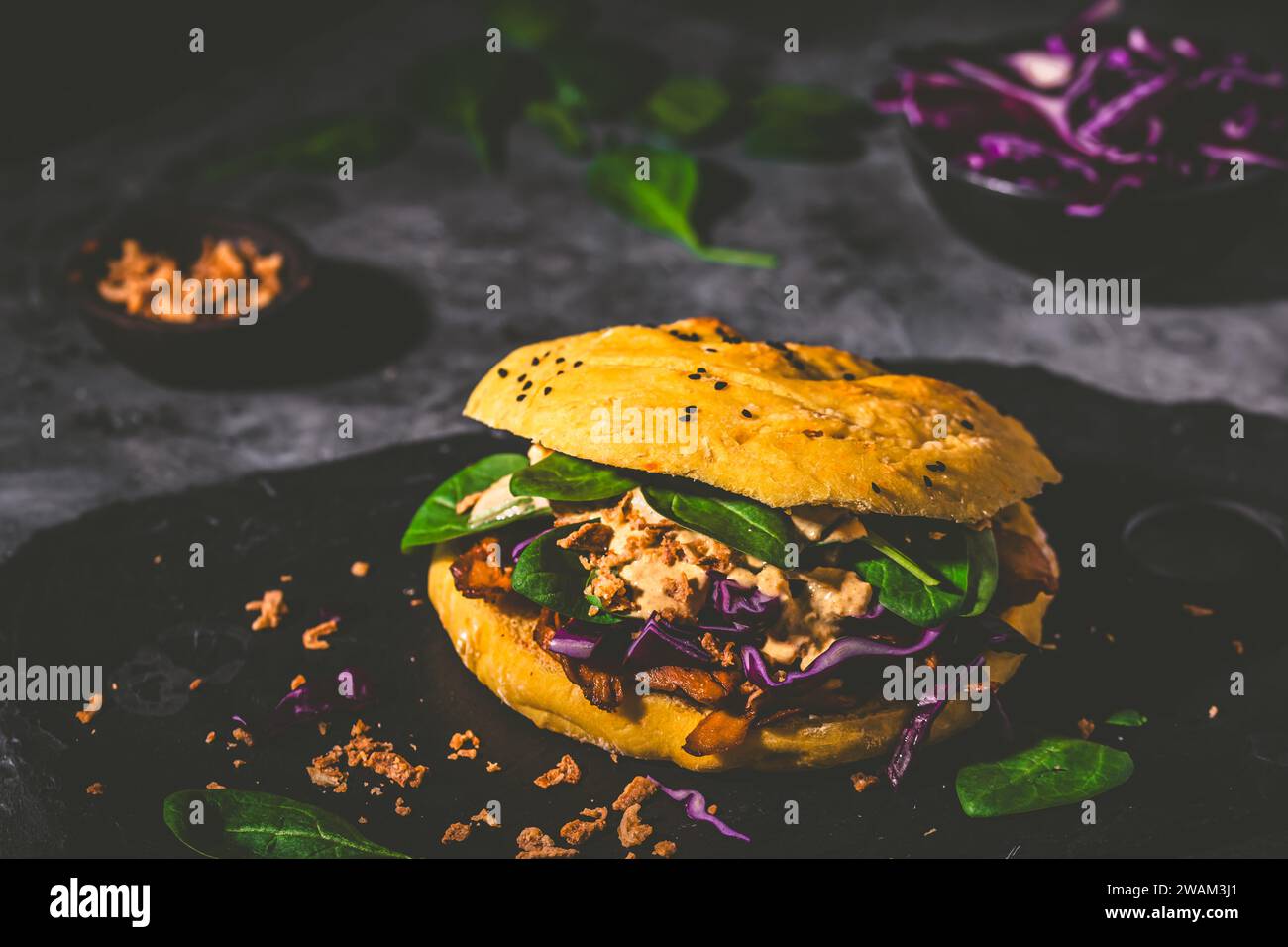 Homemade vegan doner burger in pumpkin flatbread filled with soy meat ...