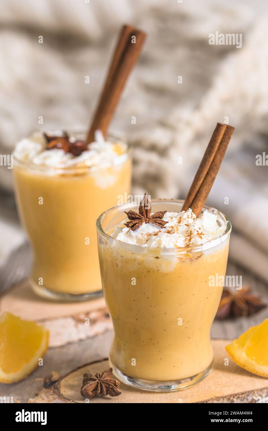 Two glasses of eggnogg with whipped cream and cinnamon. Auld Man's milk ...