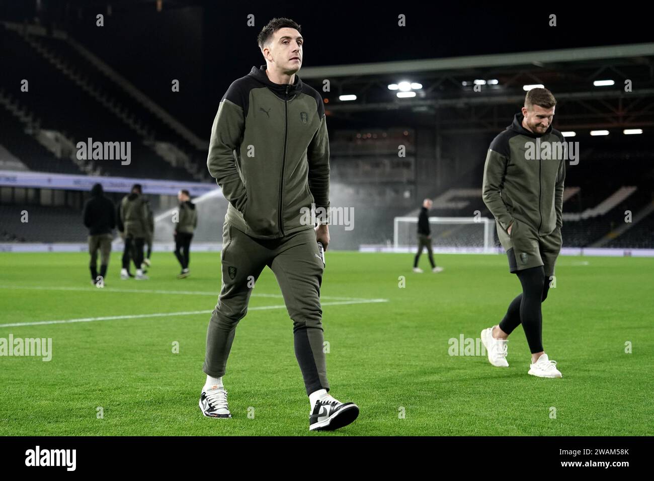 Rotherham United's Jordan Hugill (left) inspects the pitch before the ...