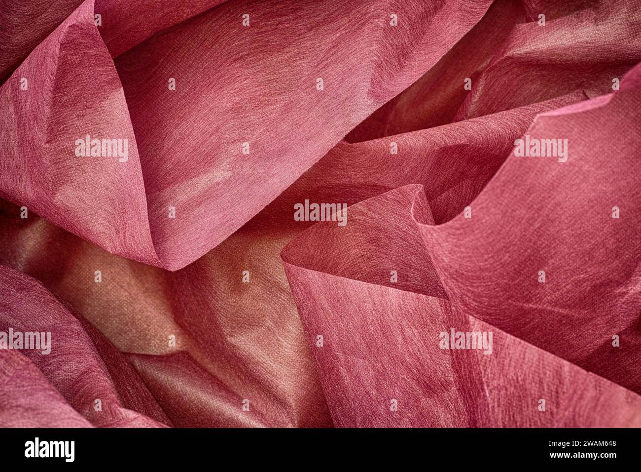 Pink crumpled paper hi-res stock photography and images - Alamy