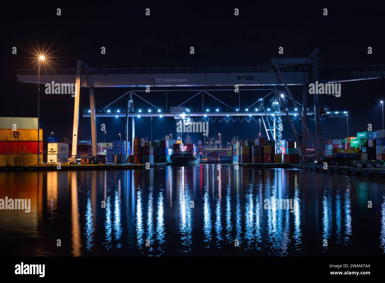 Container terminal ¨Alpherium¨ on the canalized river ¨Gouwe¨ in Alphen ...