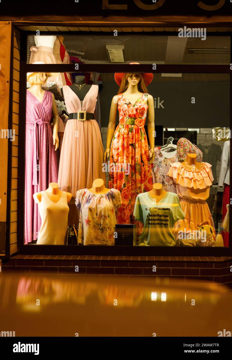 Bunch of headless mannequins show spring clothes collection. Standing ...
