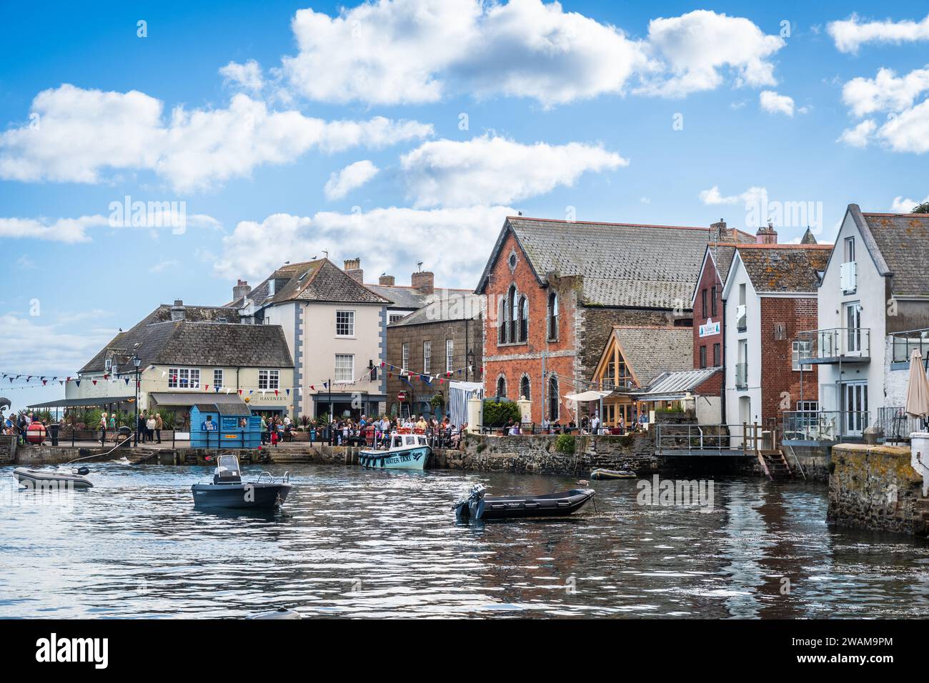 Fowey, Cornwall, UK - August 14, 2023: The busy pier in Fowey Harbour ...