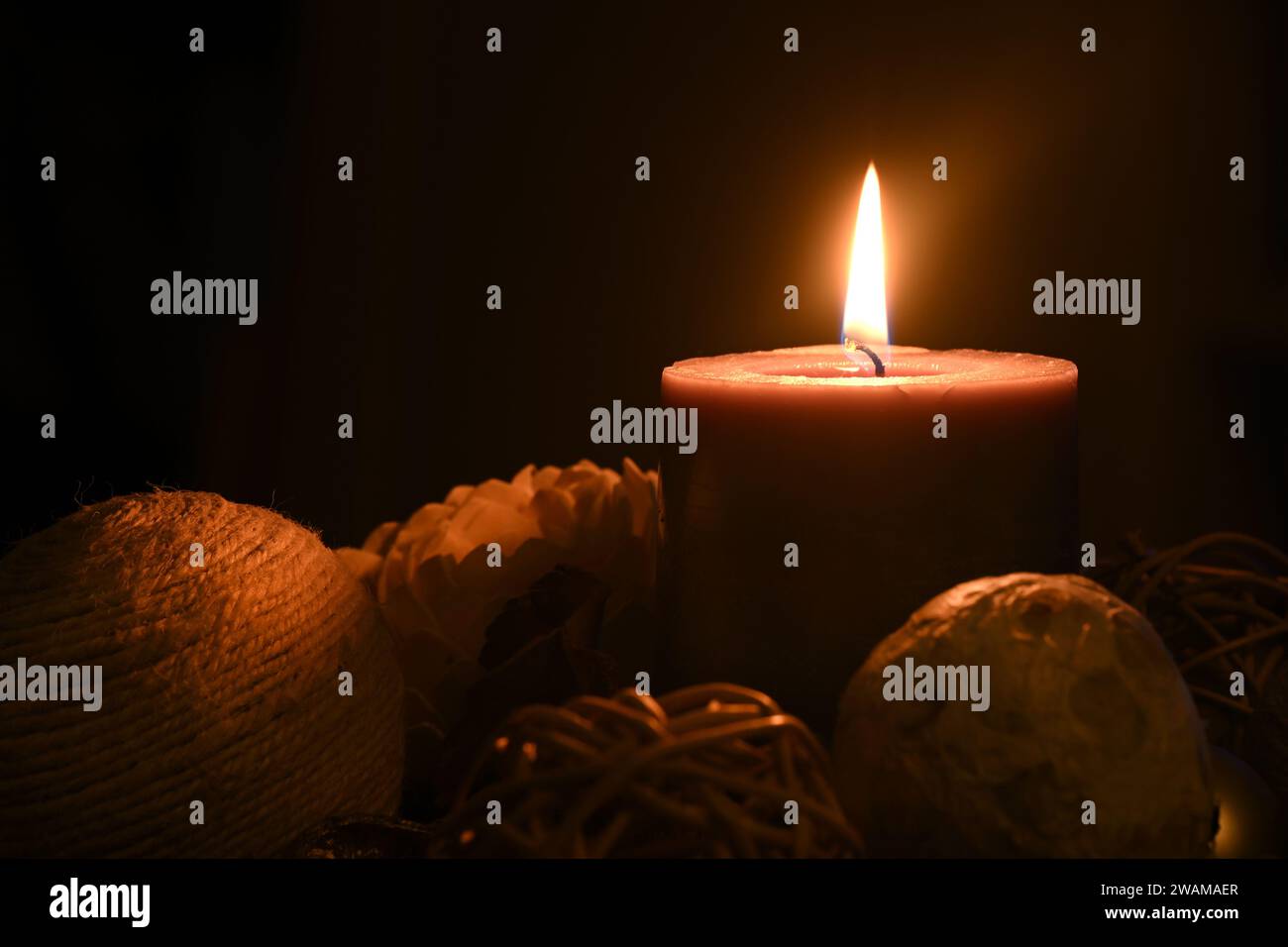 Warm candlelight in dark room with cosy decorative elements Stock Photo ...