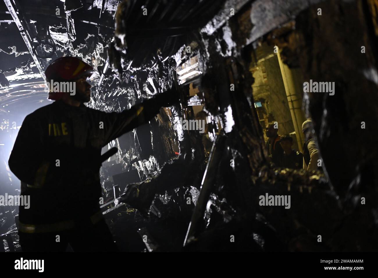 Dhaka, Dhaka, Bangladesh. 5th Jan, 2024. A Bangladeshi fire fighter ...