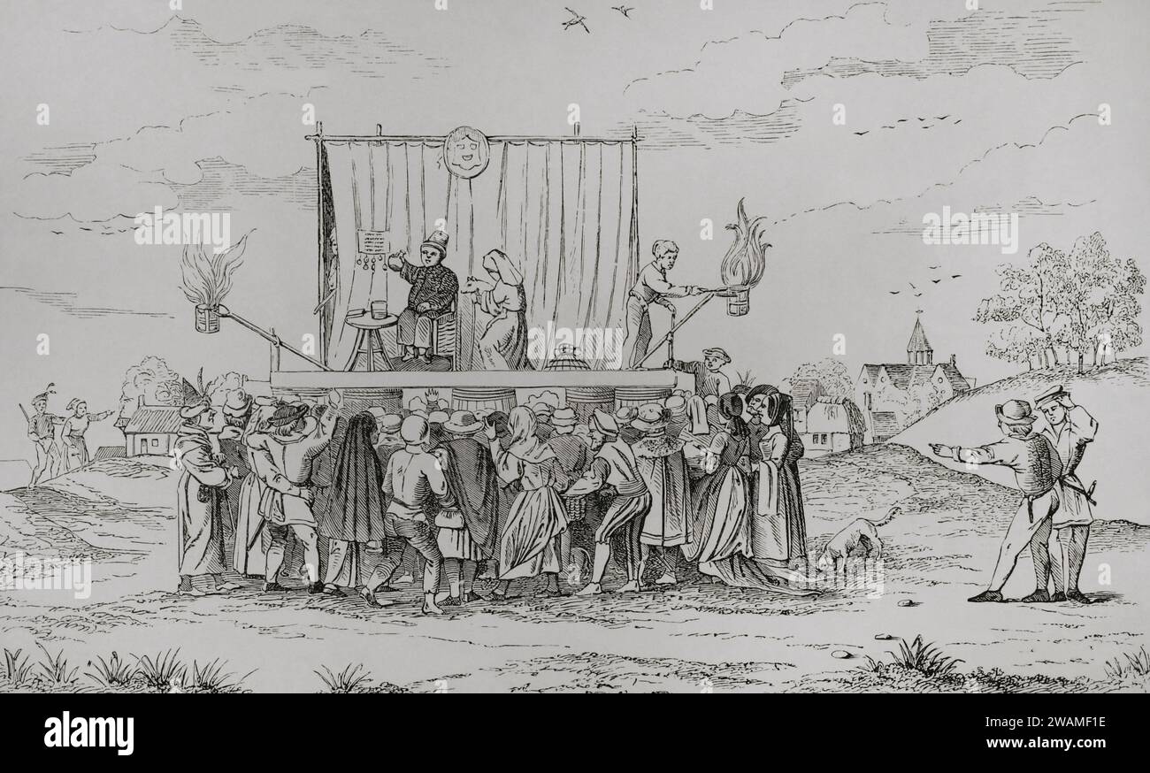 Europe. A juggler's stage set in a village. On stage a juggler and a ...