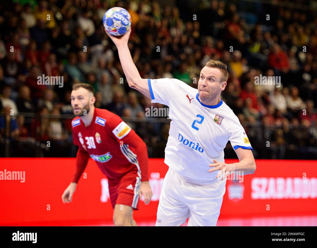 Jakub Hrstka of the Czech Republic, right, throws the ball during the ...