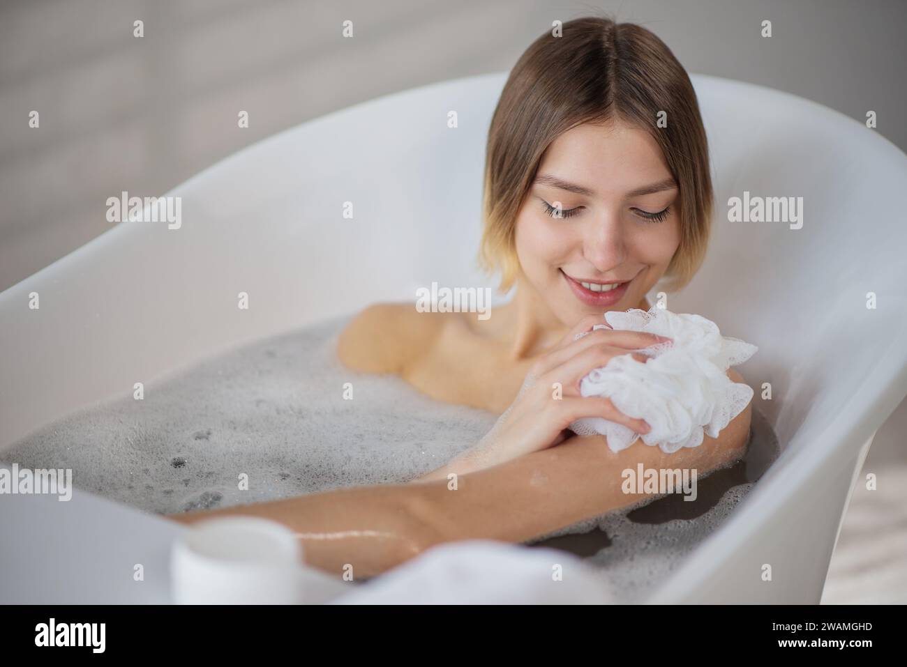 Washing and self care taking bath hi-res stock photography and images ...