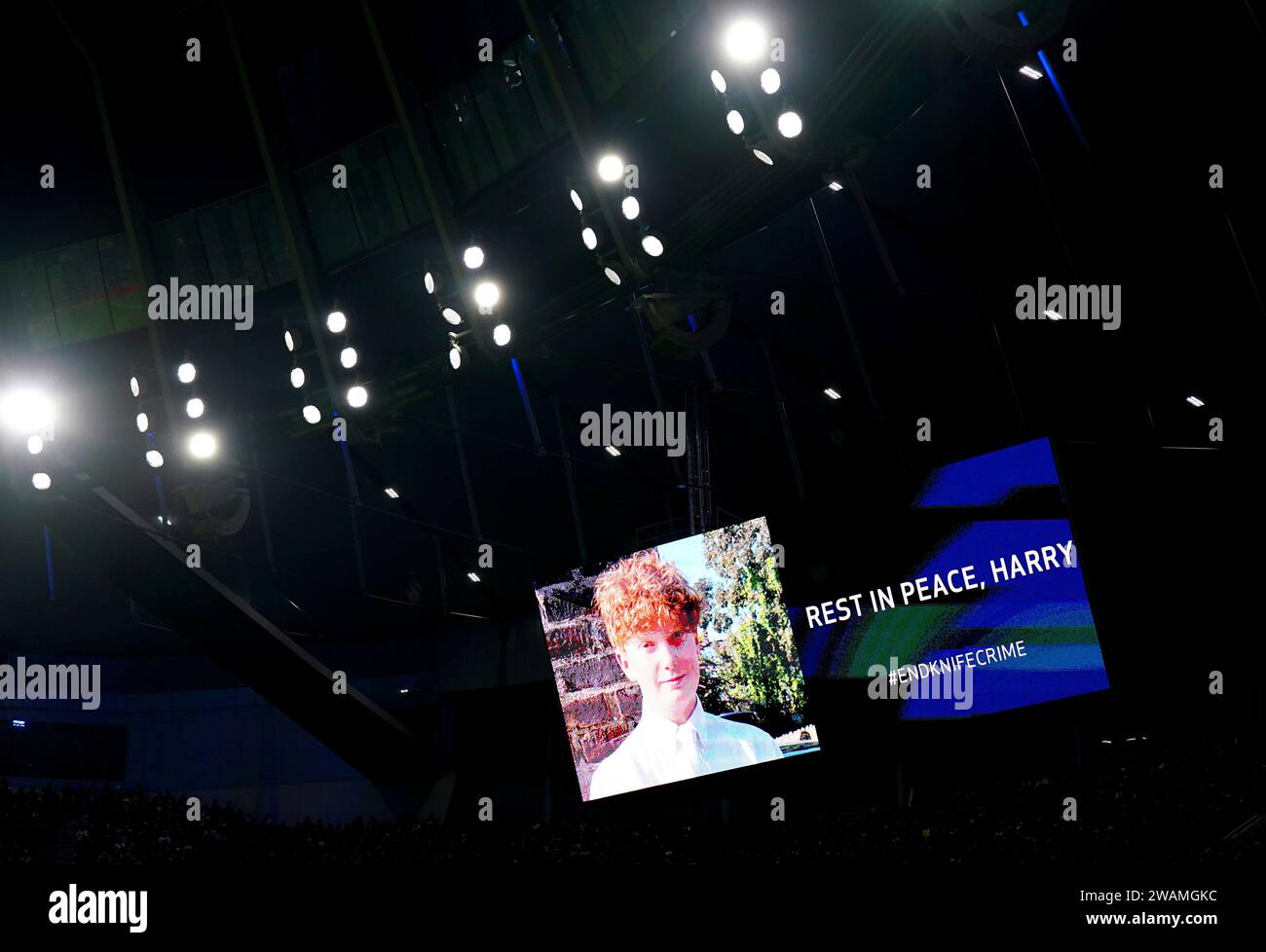 A tribute to 16-year-old Harry Pitman is shown on screen during the ...