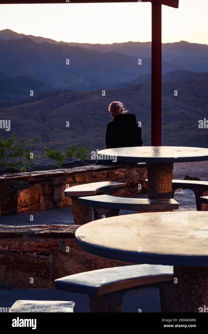 Back view of blonde woman at Sunset Point Rest Stop in Arizona, United ...
