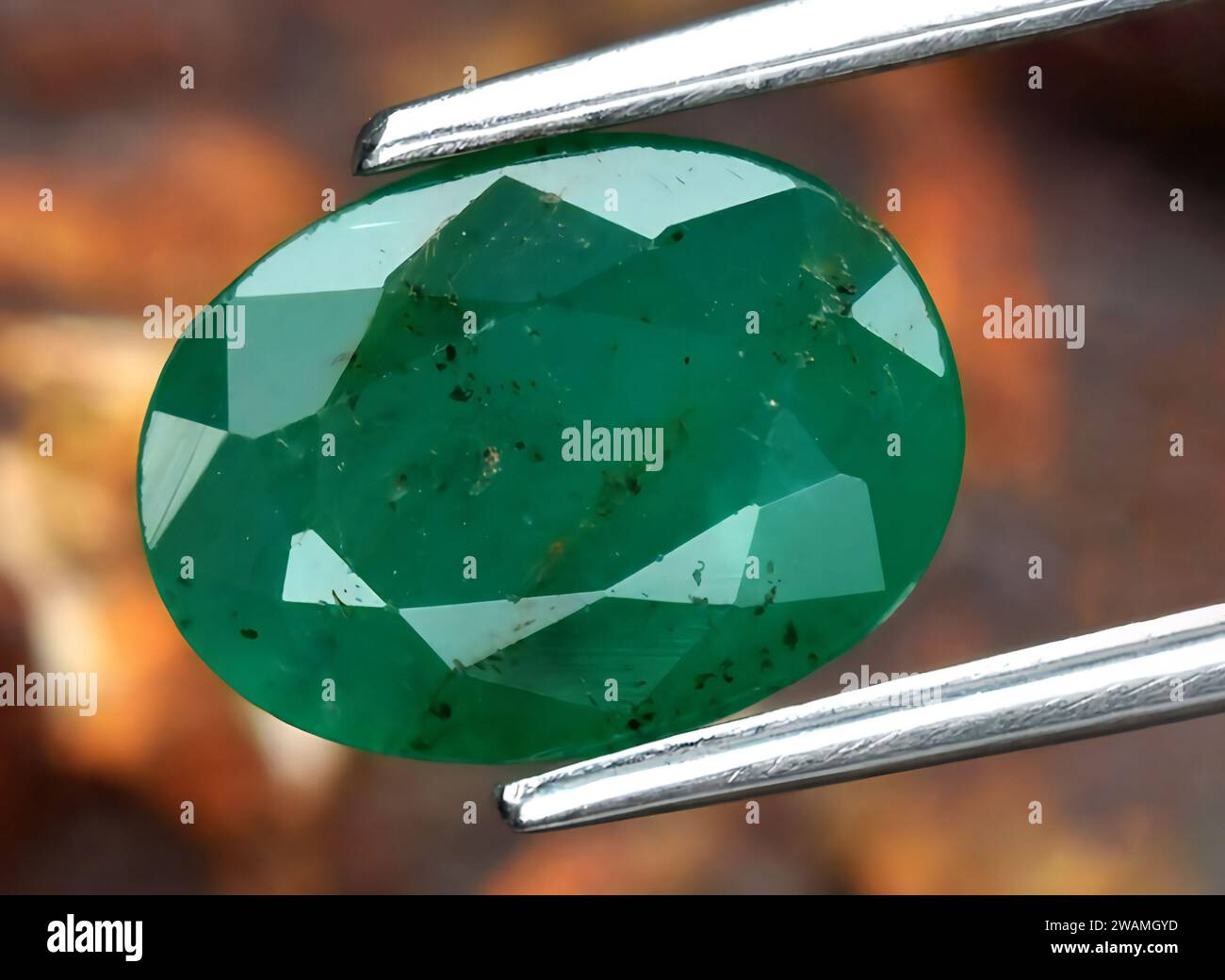 natural green emerald beryl gem on background Stock Photo - Alamy