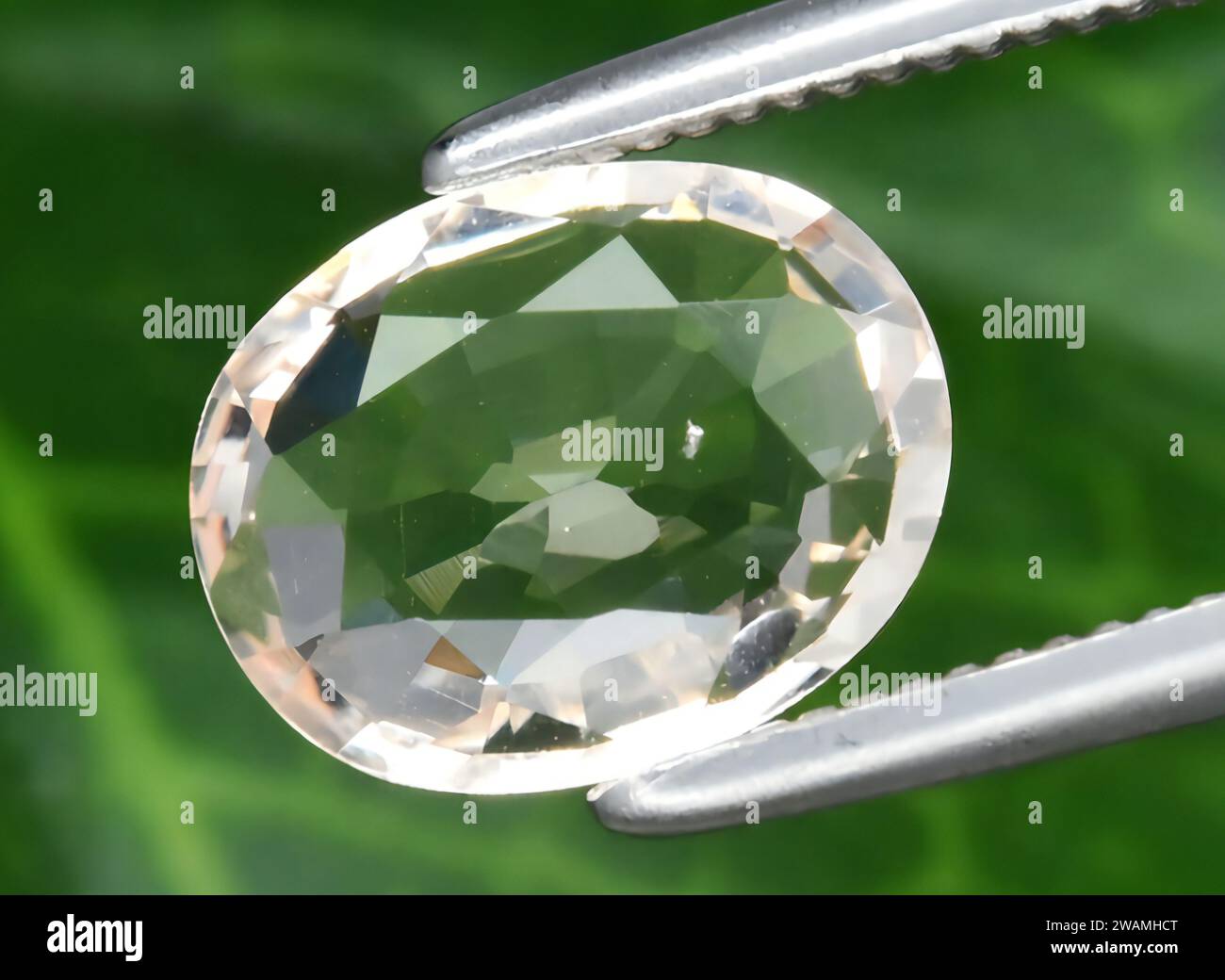 natural light peach morganite beryl gem on background Stock Photo - Alamy