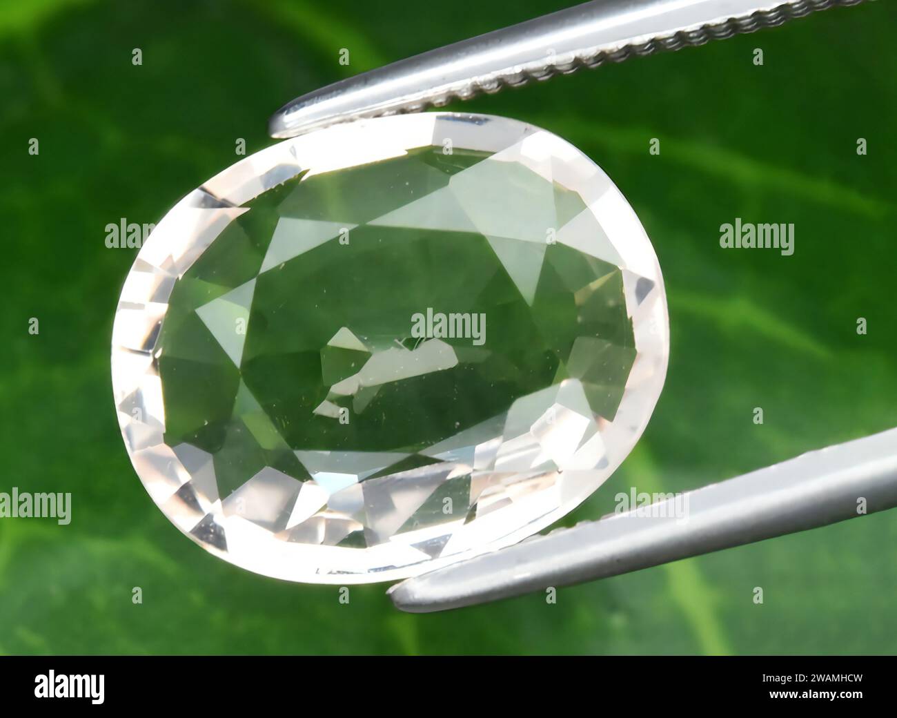 natural light peach morganite beryl gem on background Stock Photo - Alamy