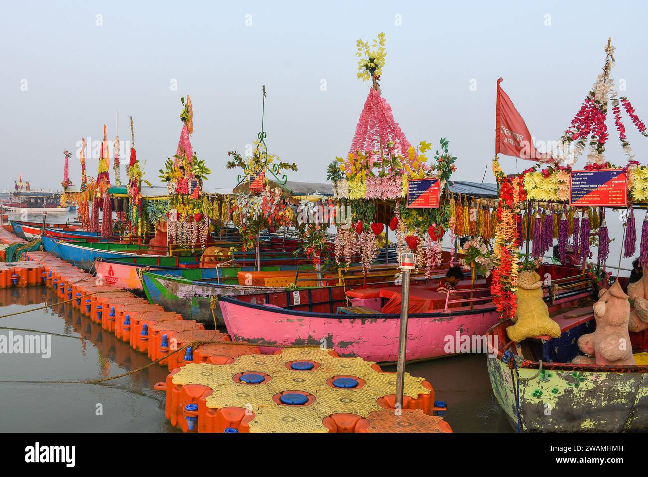 Boats are anchored on the banks of the Sarayu river. The ancient city ...