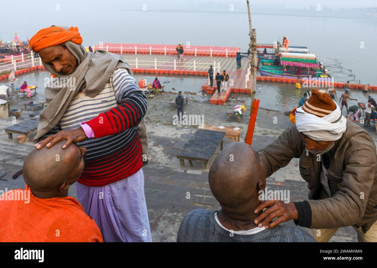 Devotees ritually shave their heads as part of the Hindu rituals before ...